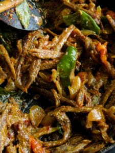 Sri Lankan dried sprats cooked in tomato-onion fry. | ISLAND SMILE